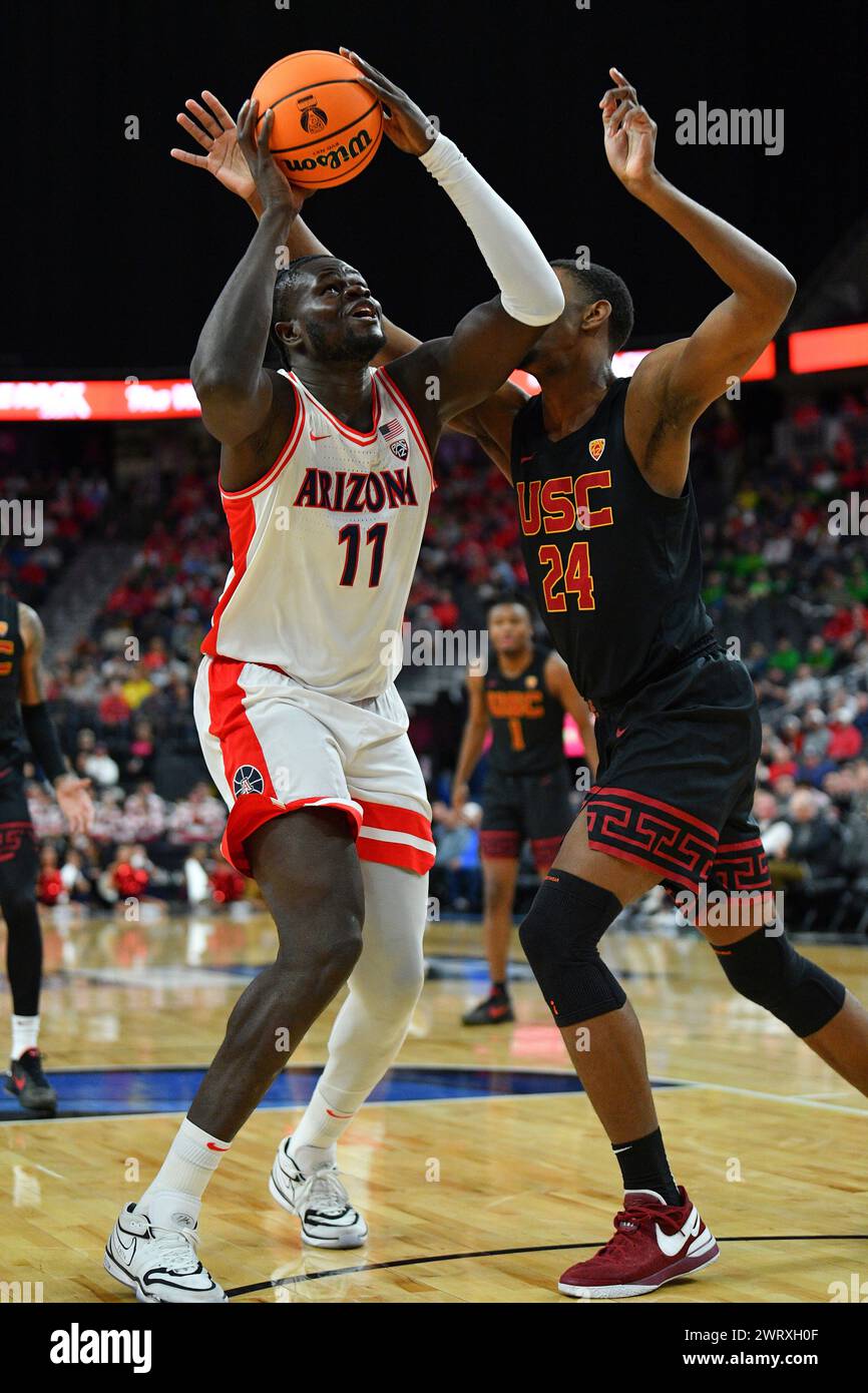 LAS VEGAS, NV - MARCH 14: Arizona Wildcats center Oumar Ballo (11) goes up for a shot as USC ...