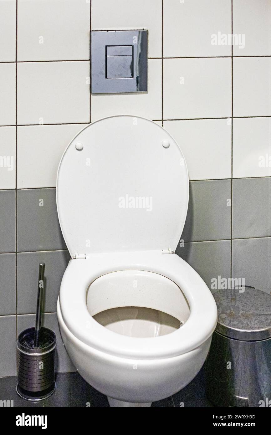 white open toilet in a stylish light interior Stock Photo - Alamy
