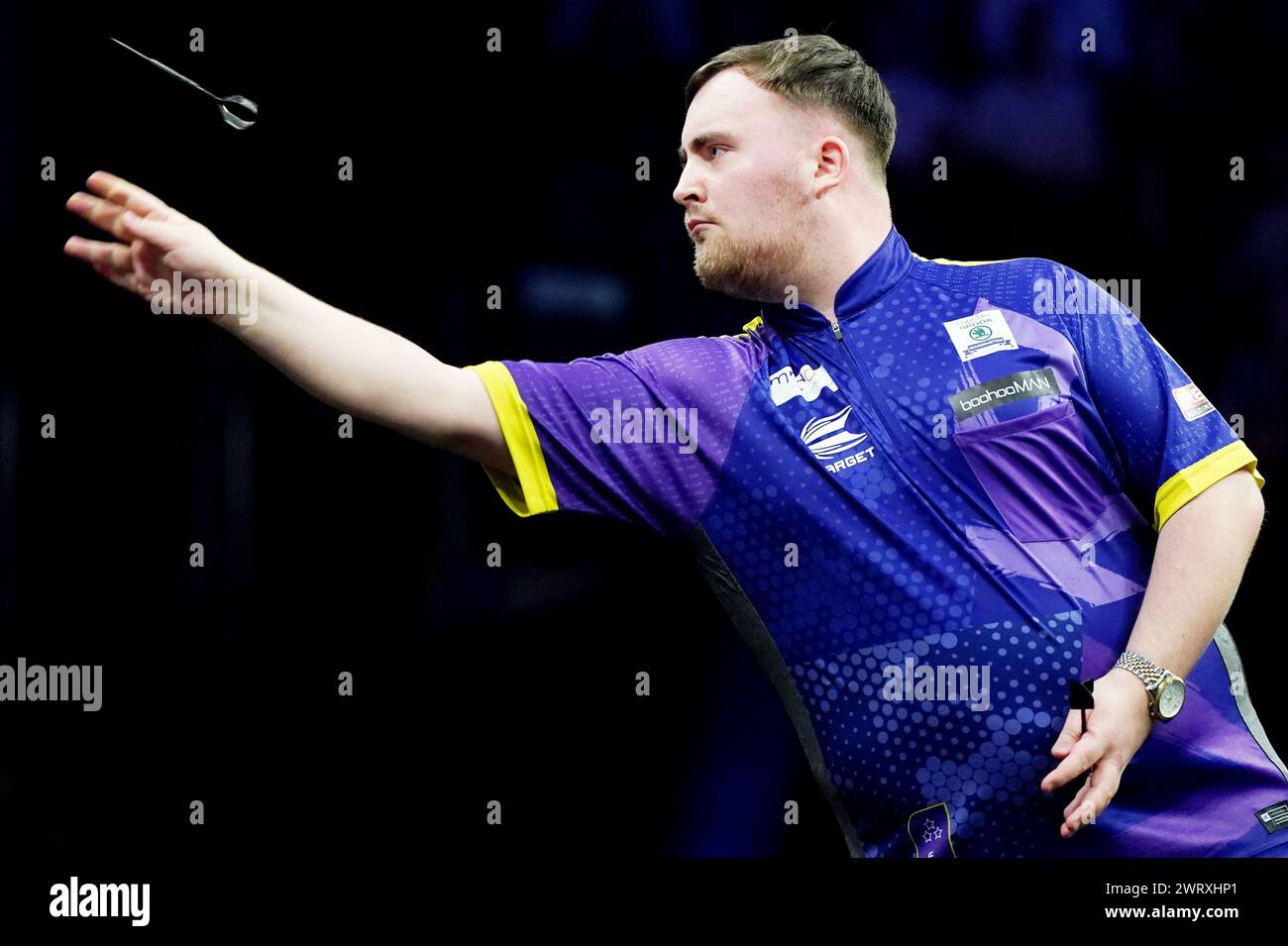 Luke Littler in action against Michael van Gerwen (not pictured) on ...