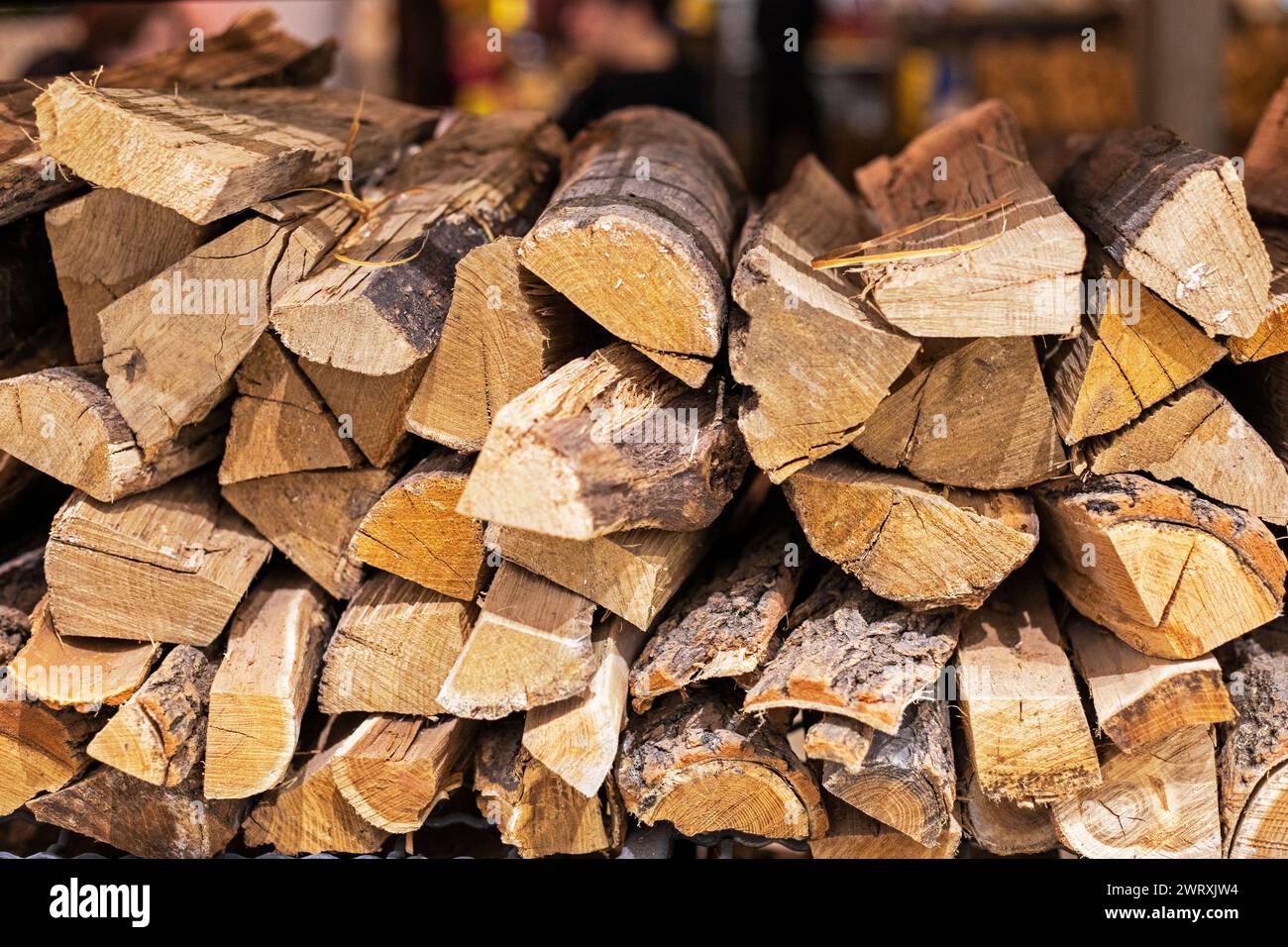 stacked oak firewood for the fireplace and grill Stock Photo - Alamy
