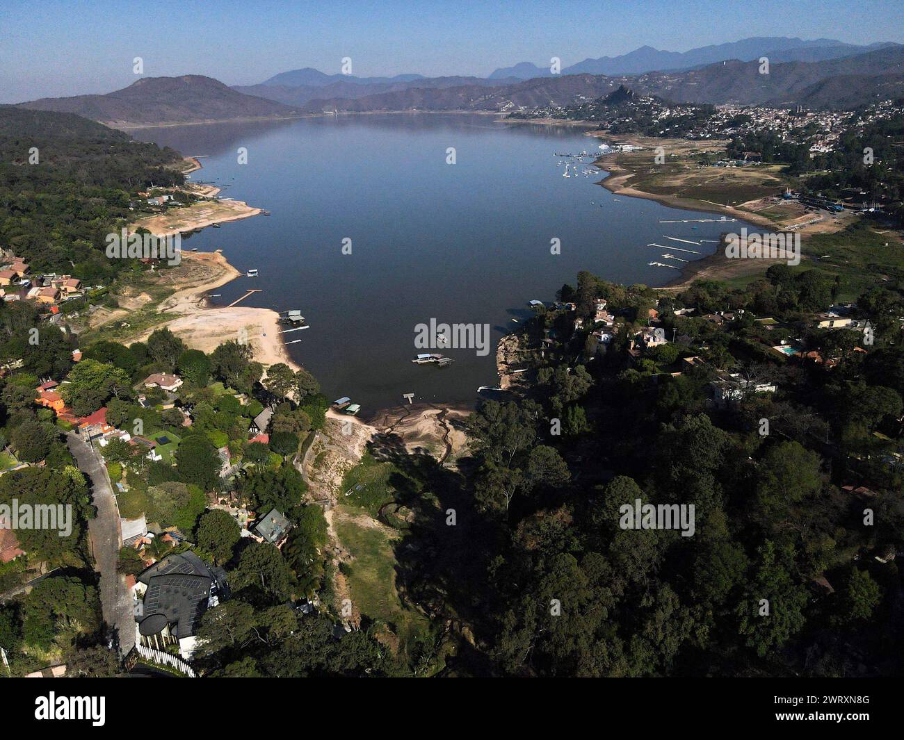 The banks of the Miguel Aleman dam lie exposed due to low water levels in Valle de Bravo, Mexico ...
