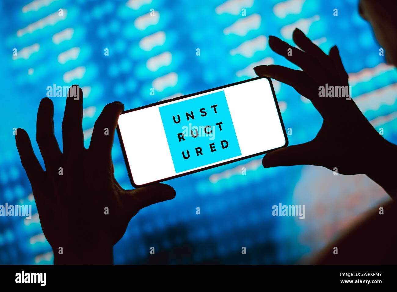 In this photo illustration, the Unstructured Technologies logo is ...