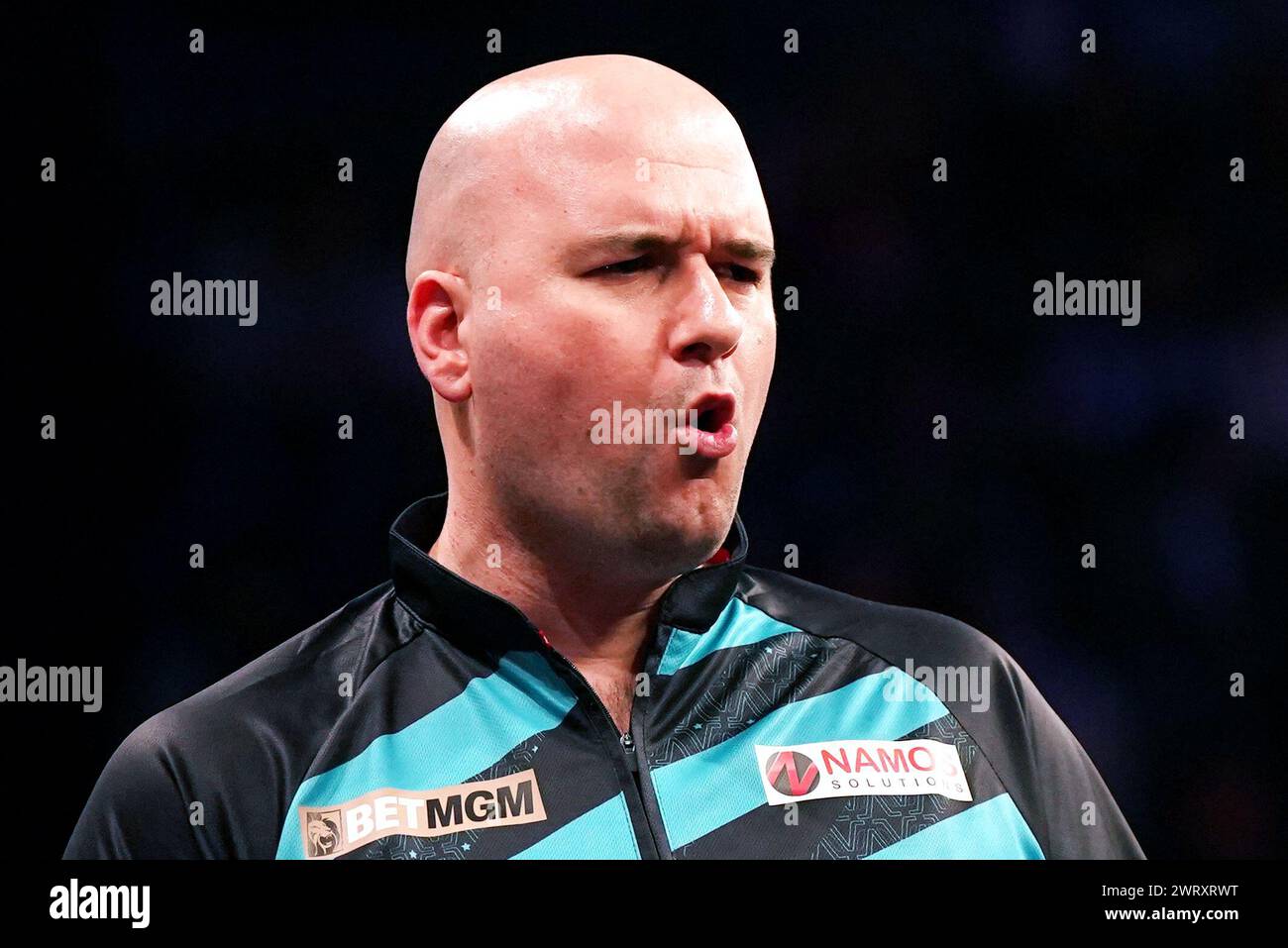 Rob Cross reacts during their game against Nathan Aspinall (not ...