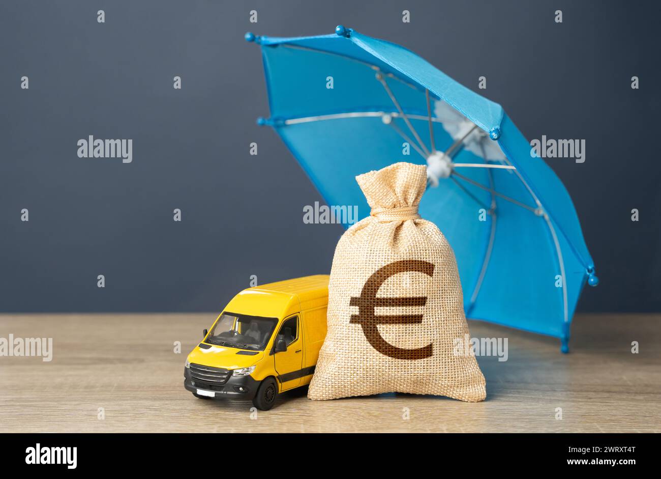 Delivery van and euro money bag under an umbrella. Cargo and parcel ...