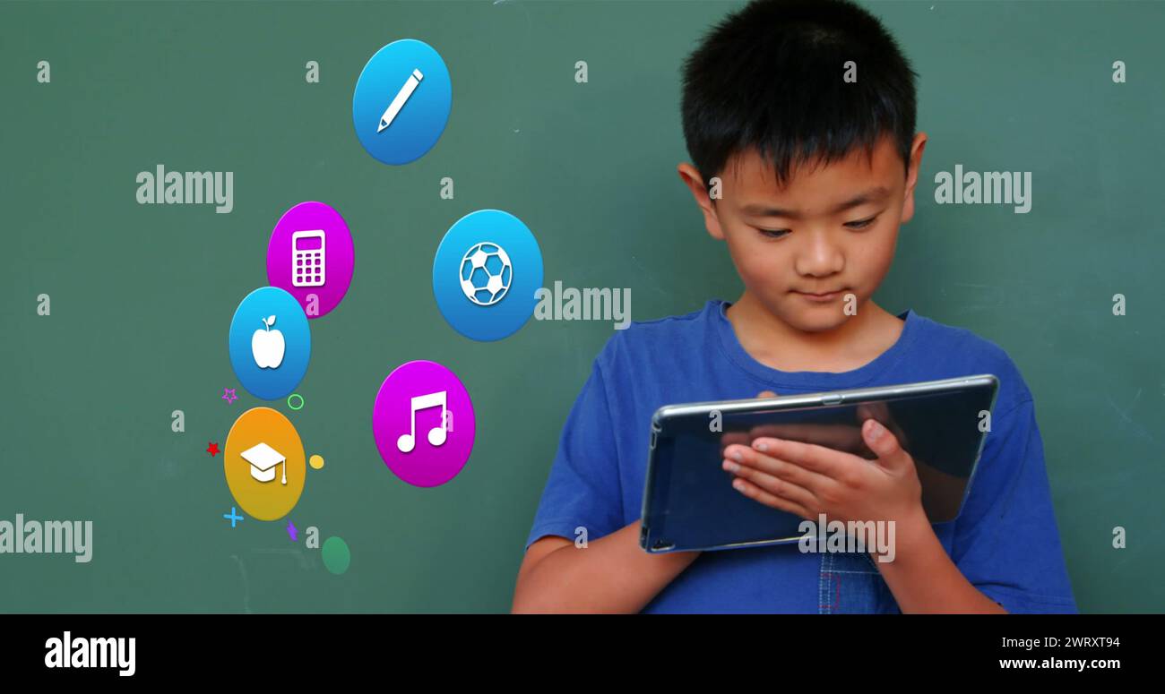 Image of colorful icons over asian boy using tablet Stock Photo - Alamy