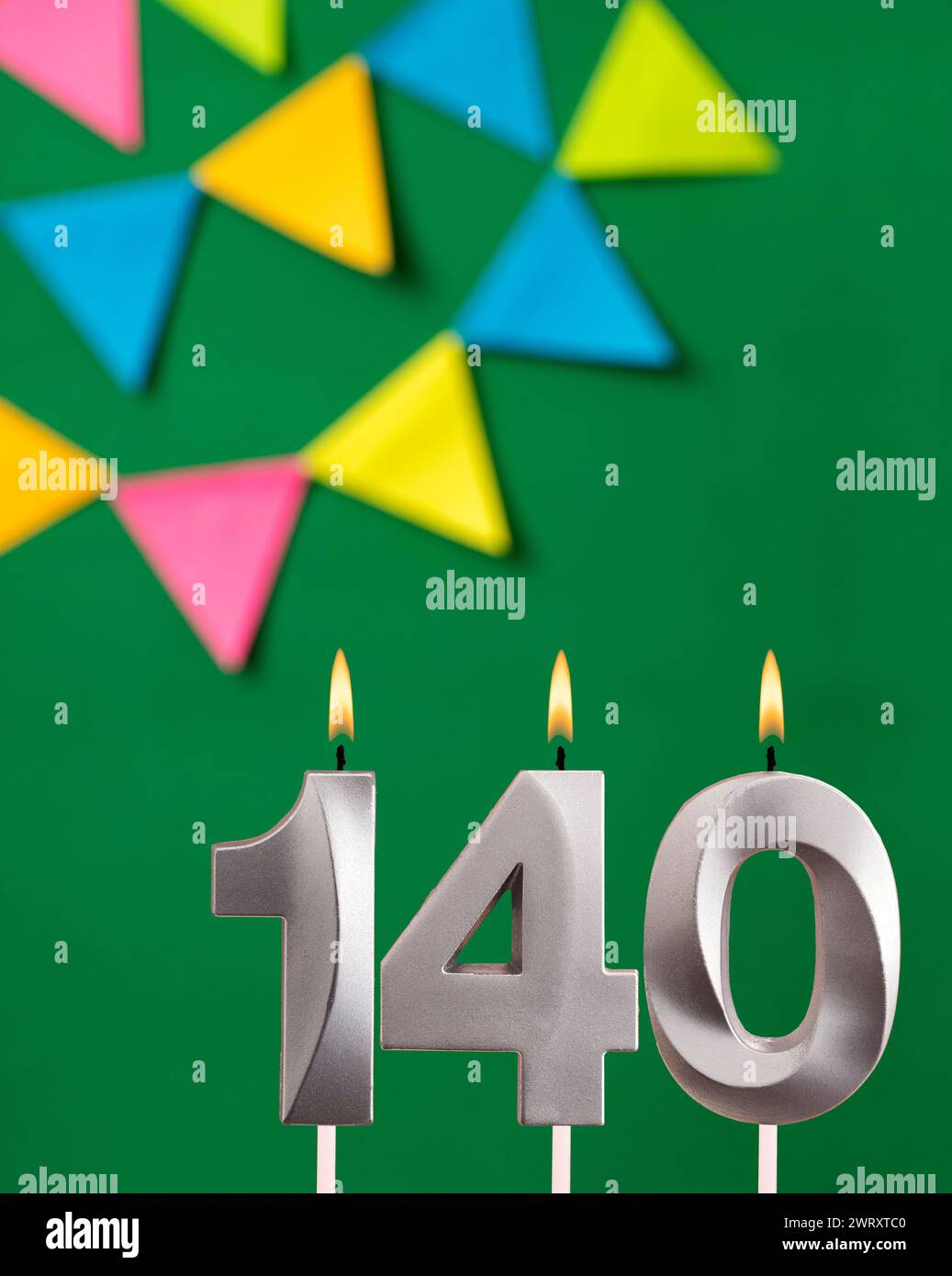 Candle number 140 birthday - Green anniversary card with pennants Stock Photo - Alamy