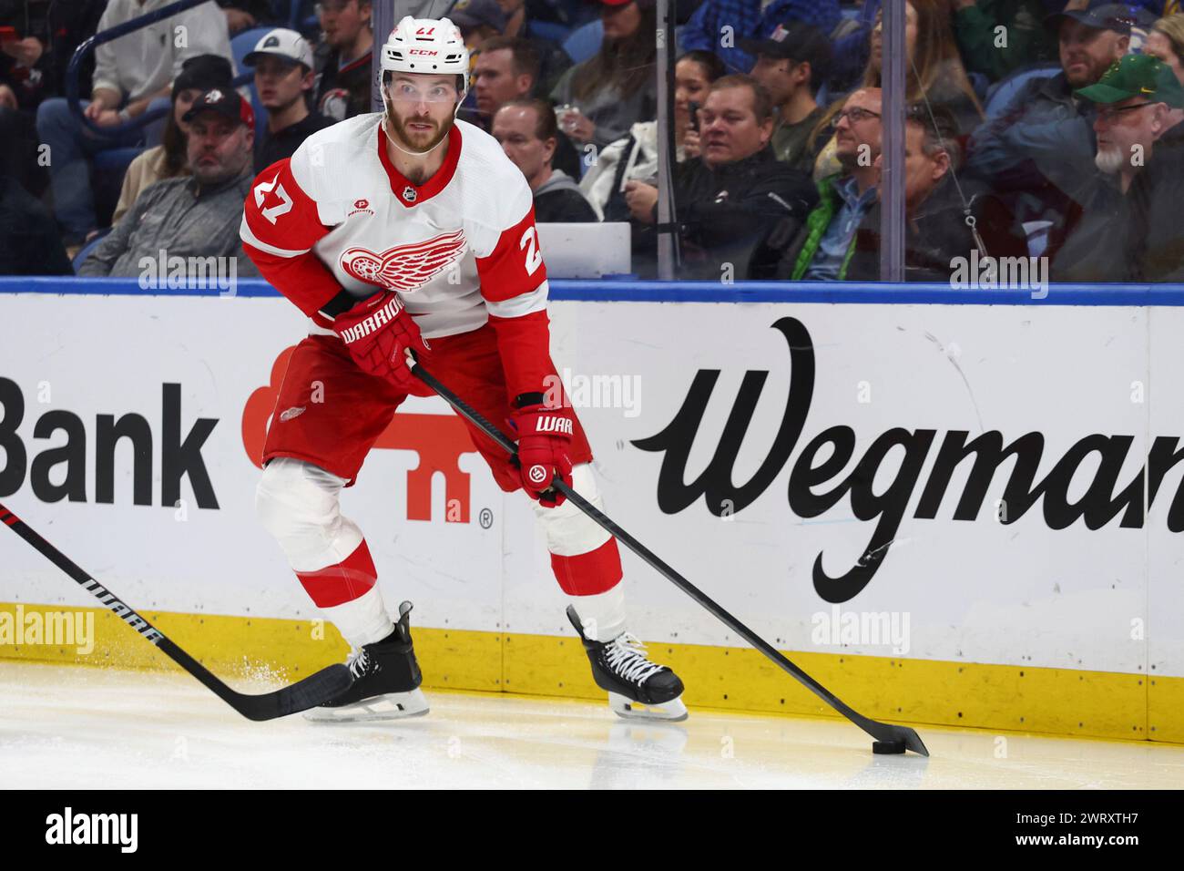 Detroit Red Wings center Michael Rasmussen (27) controls the puck ...