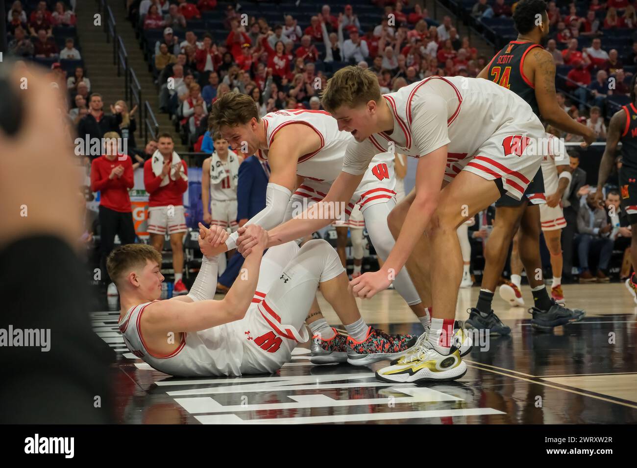 Minneapolis, Minnesota, USA. 14th Mar, 2024. Wisconsin Badgers guard ...