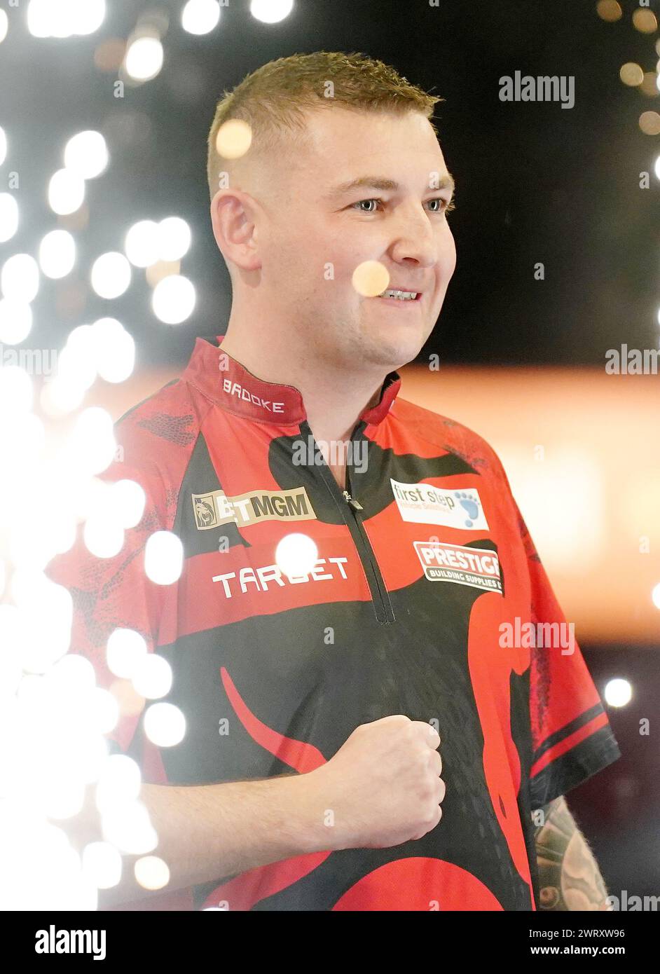 Nathan Aspinall celebrates victory over Rob Cross (not pictured) on ...
