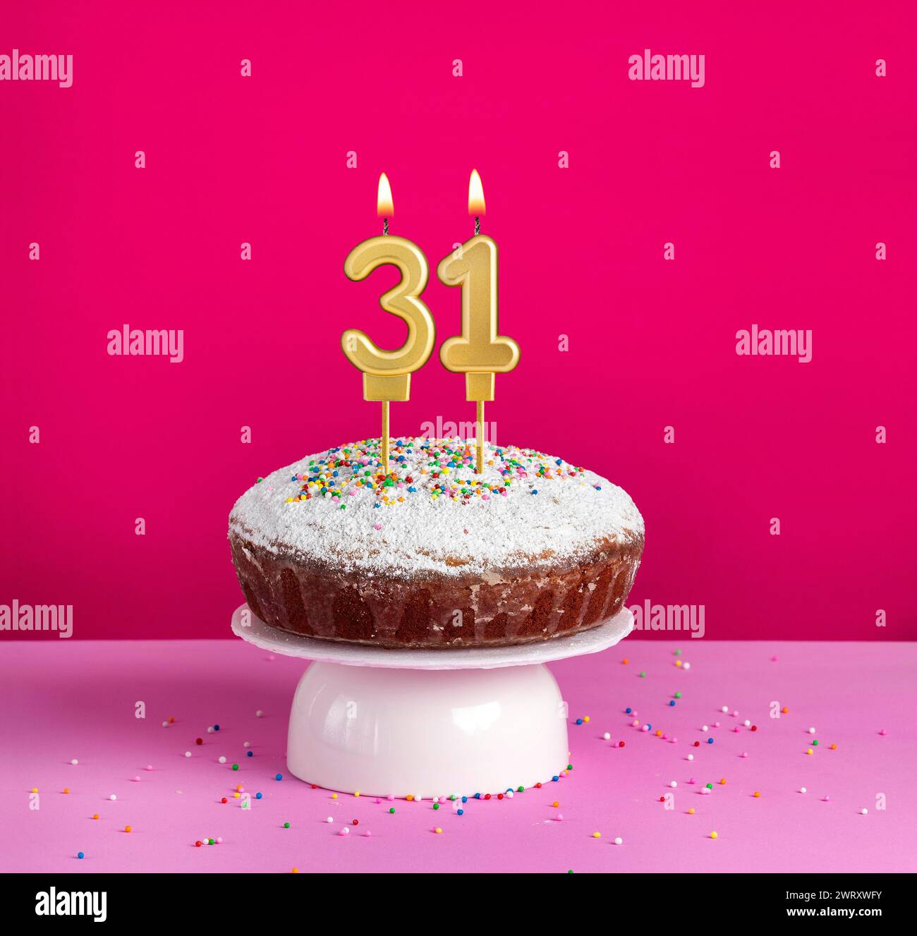 Birthday cake with number 31 candle on pink background Stock Photo - Alamy