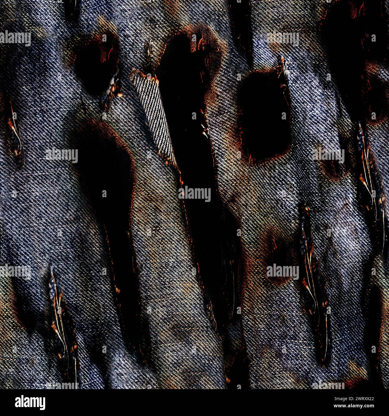 Seamless texture photo of blue colored burned and torn denim or jeans ...
