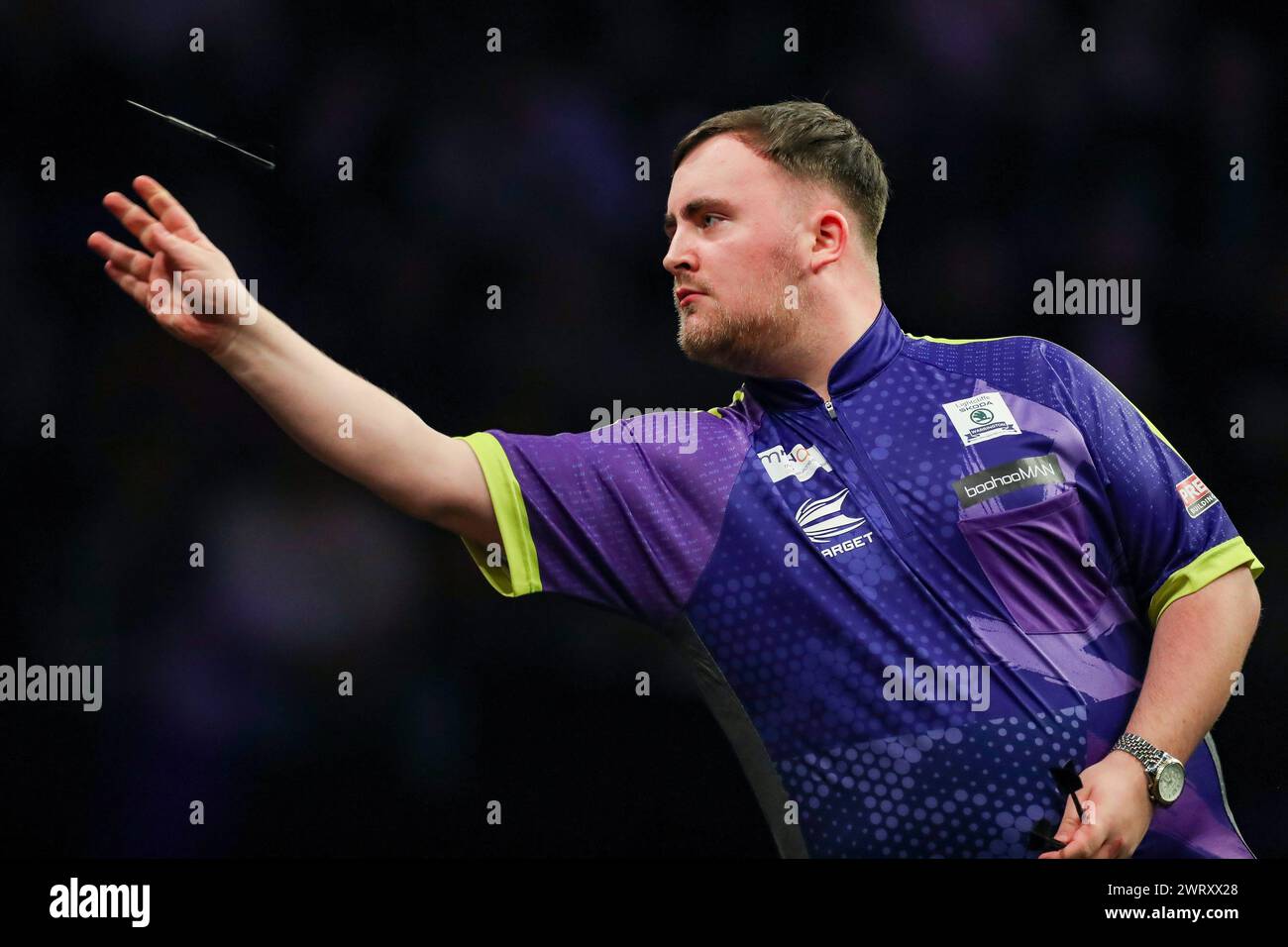 Nottingham, UK. 14th Mar, 2024. Luke Littler throws during the 2024 ...