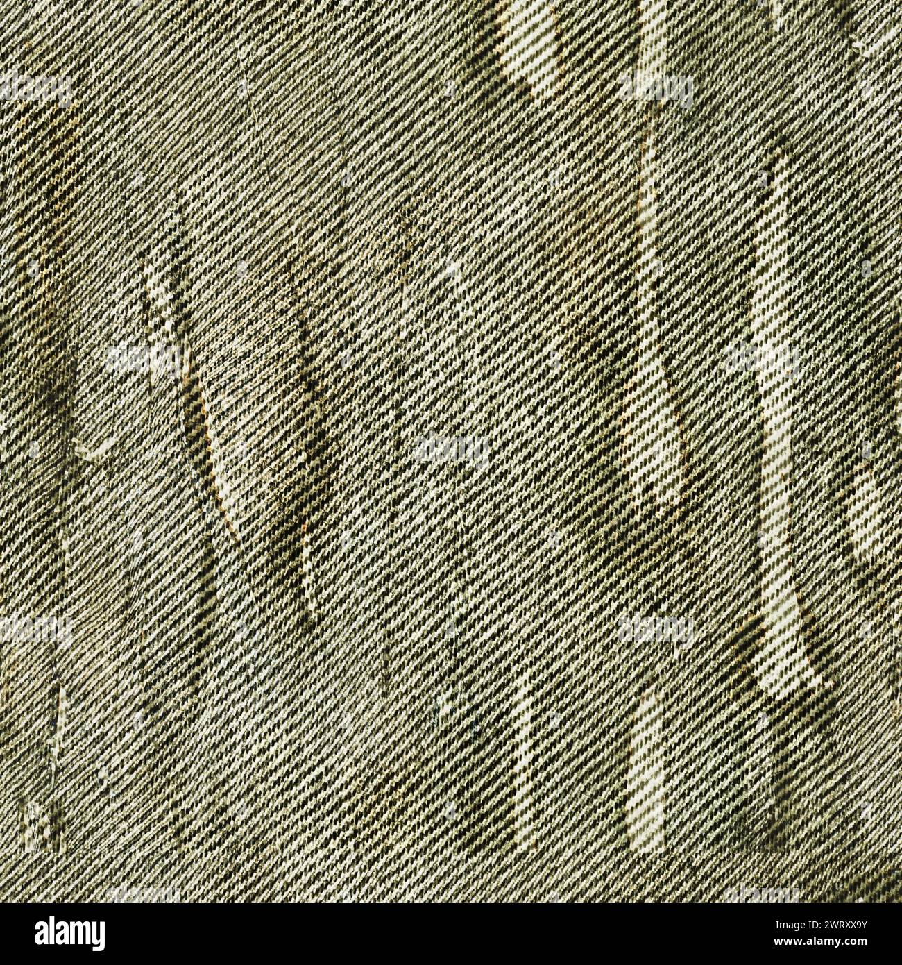 Seamless texture photo of khaki colored cutted torn denim or jeans ...