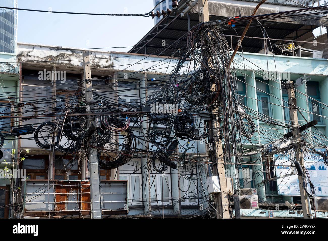 Overhead cables on a street in Bangkok, Thailand Stock Photo - Alamy