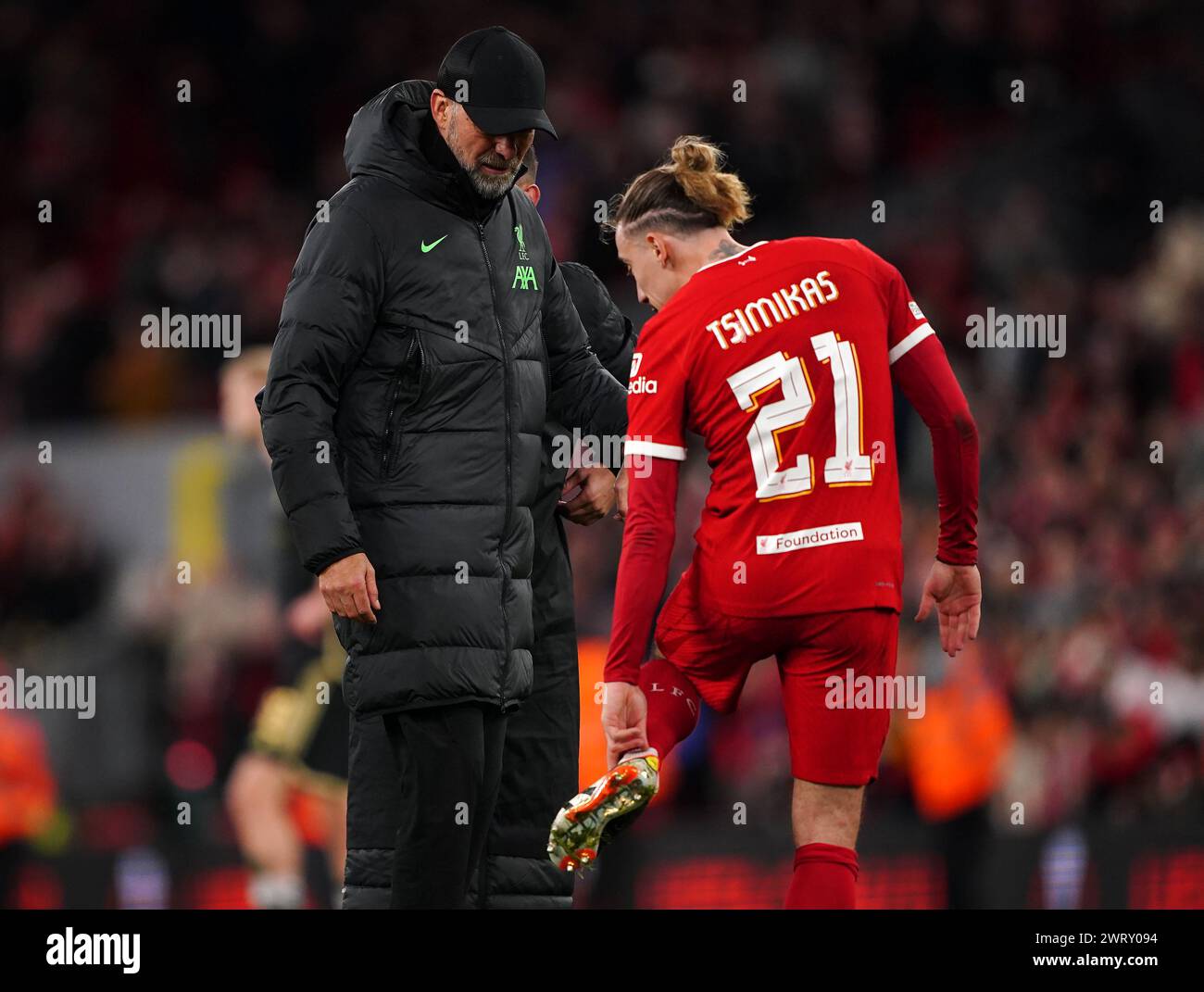 Liverpool manager Jurgen Klopp greets Kostas Tsimikas following the ...