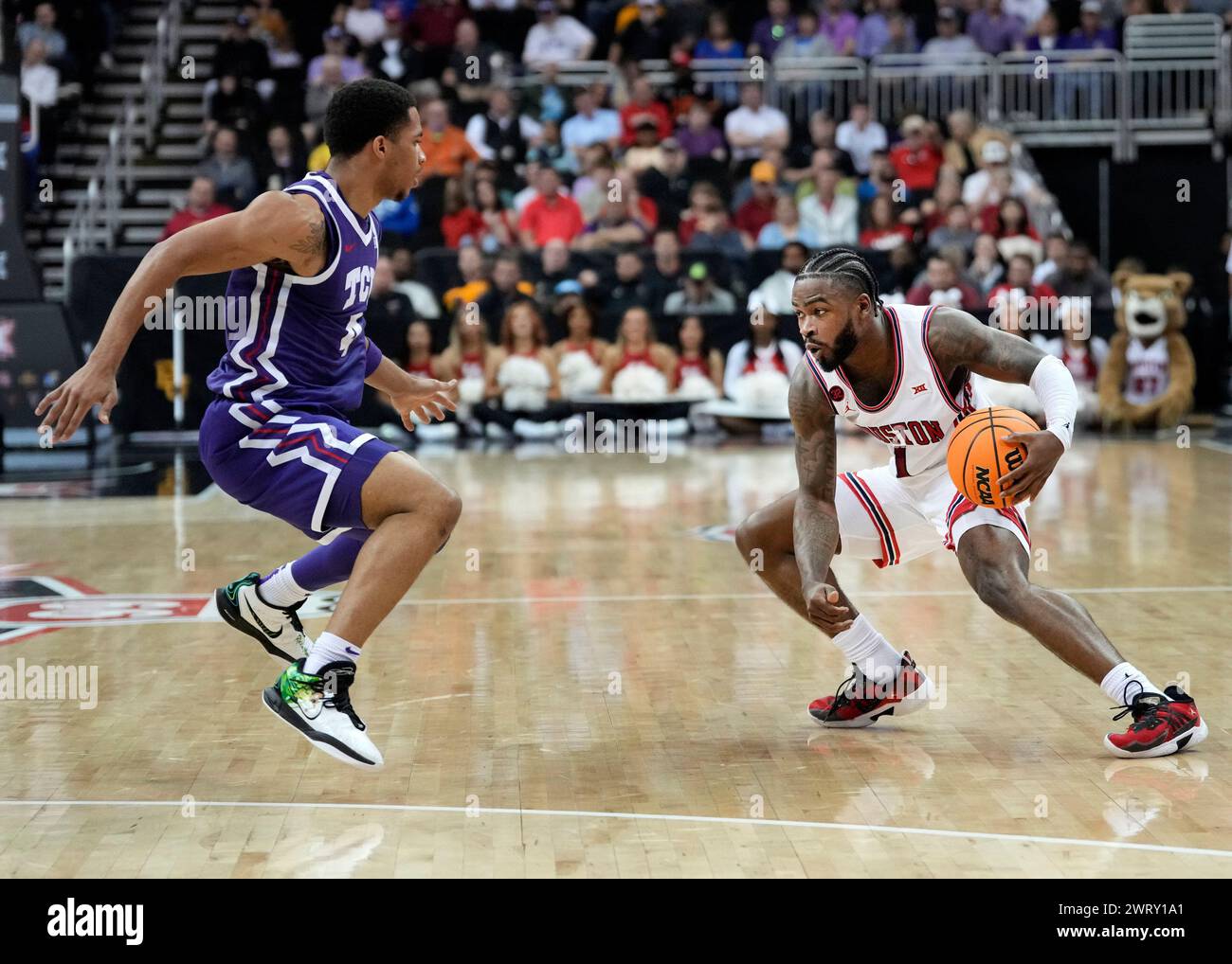 MAR 14 2024: Houston Cougars guard Jamal Shead (1) works on TCU Horned ...