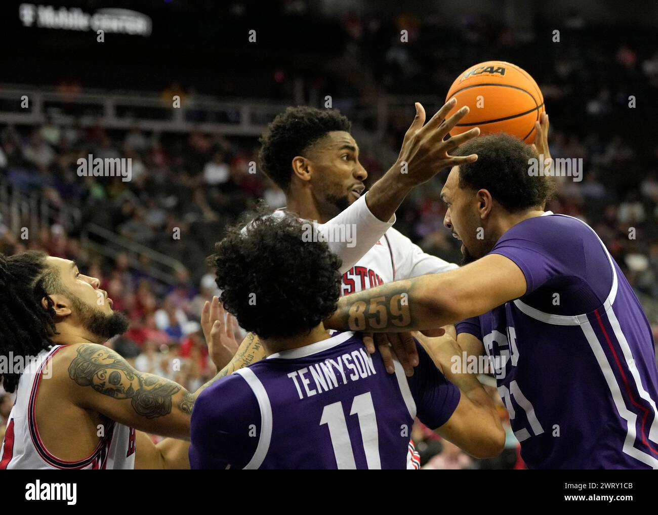 MAR 14 2024: Houston Cougars guard Mylik Wilson (8) hauls in a rebound ...