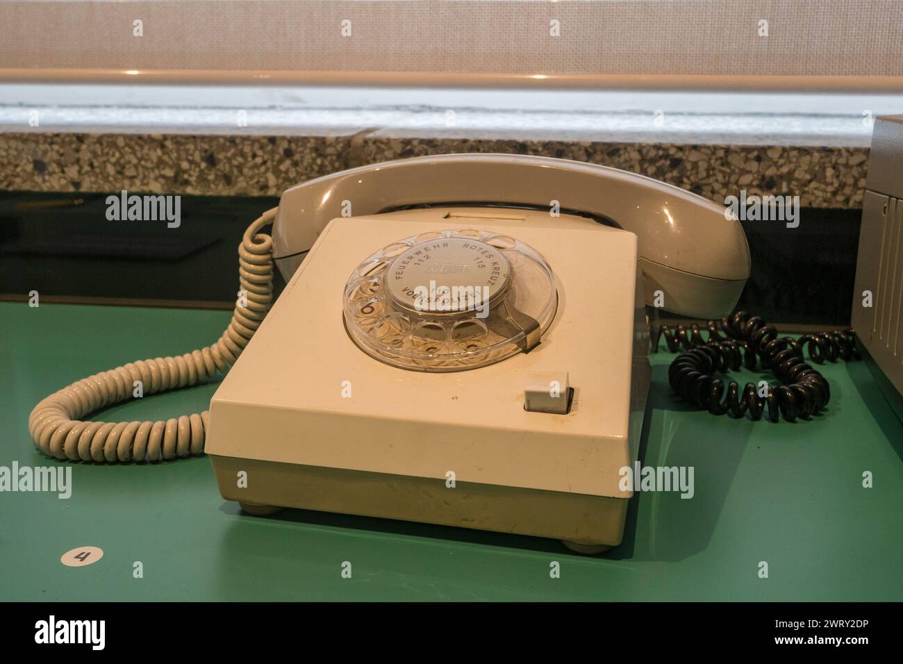 A typical 1970s GDR Cold War era RTF rotary dial telephone on display ...