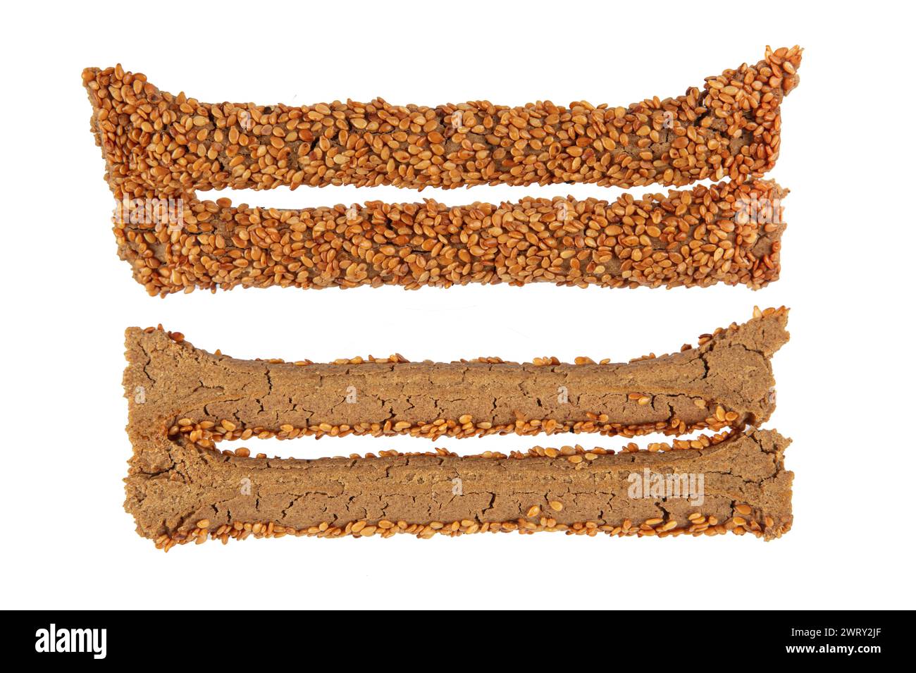 Sesame stick crackers, crispy bread straw. Pretzel bread sticks with ...