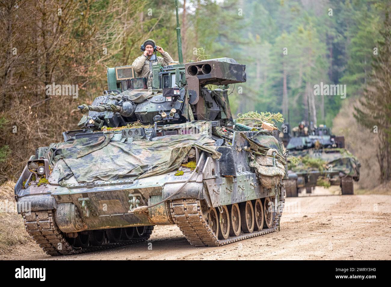 Members of the German Army's 411th Panzergrenadier Battalion push ...