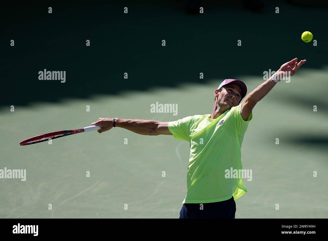 Tommy Paul, of the United States, serves to Casper Ruud, of Norway ...