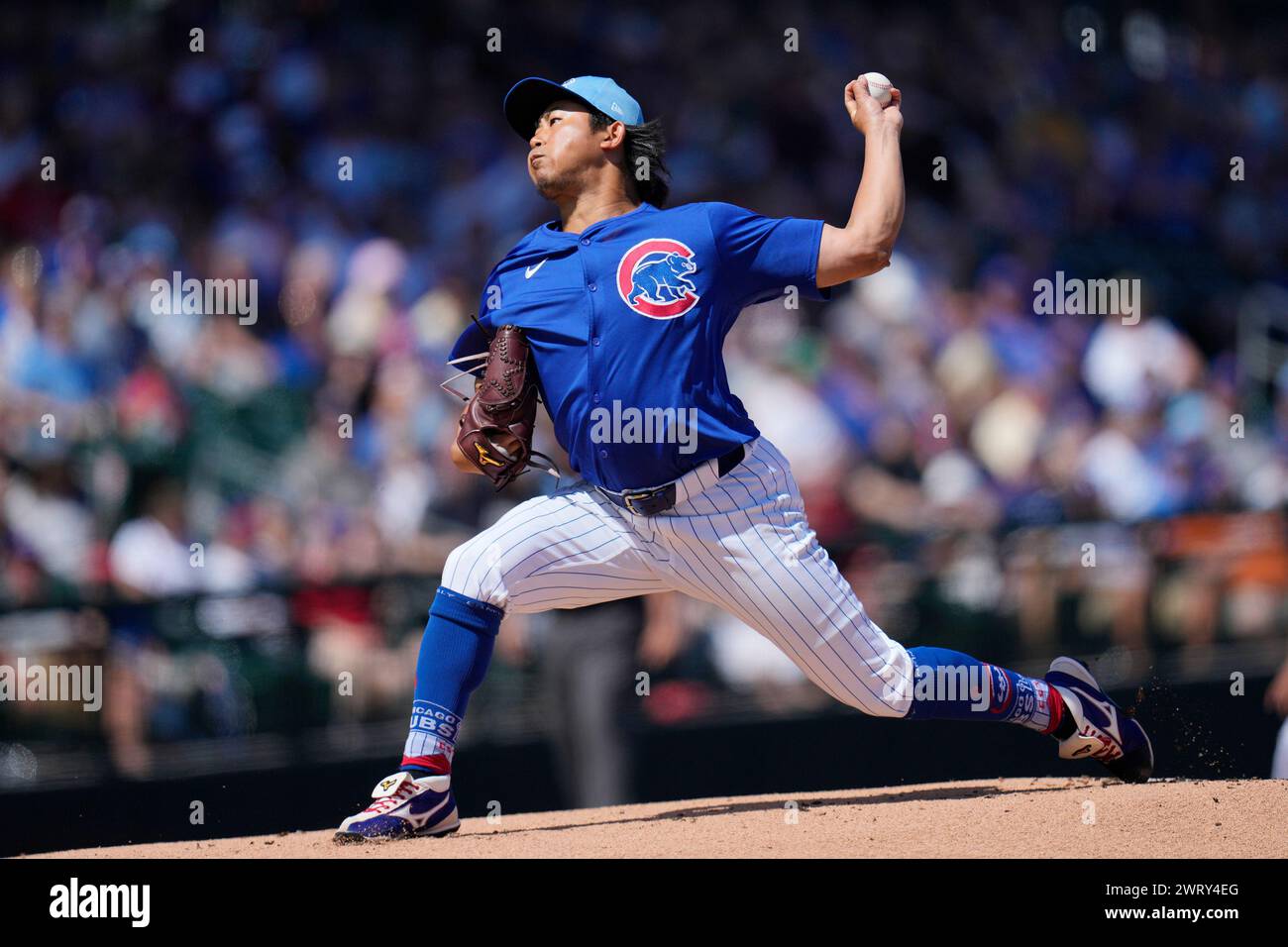 Chicago Cubs starting pitcher Shota Imanaga, of Japan, throws to an ...