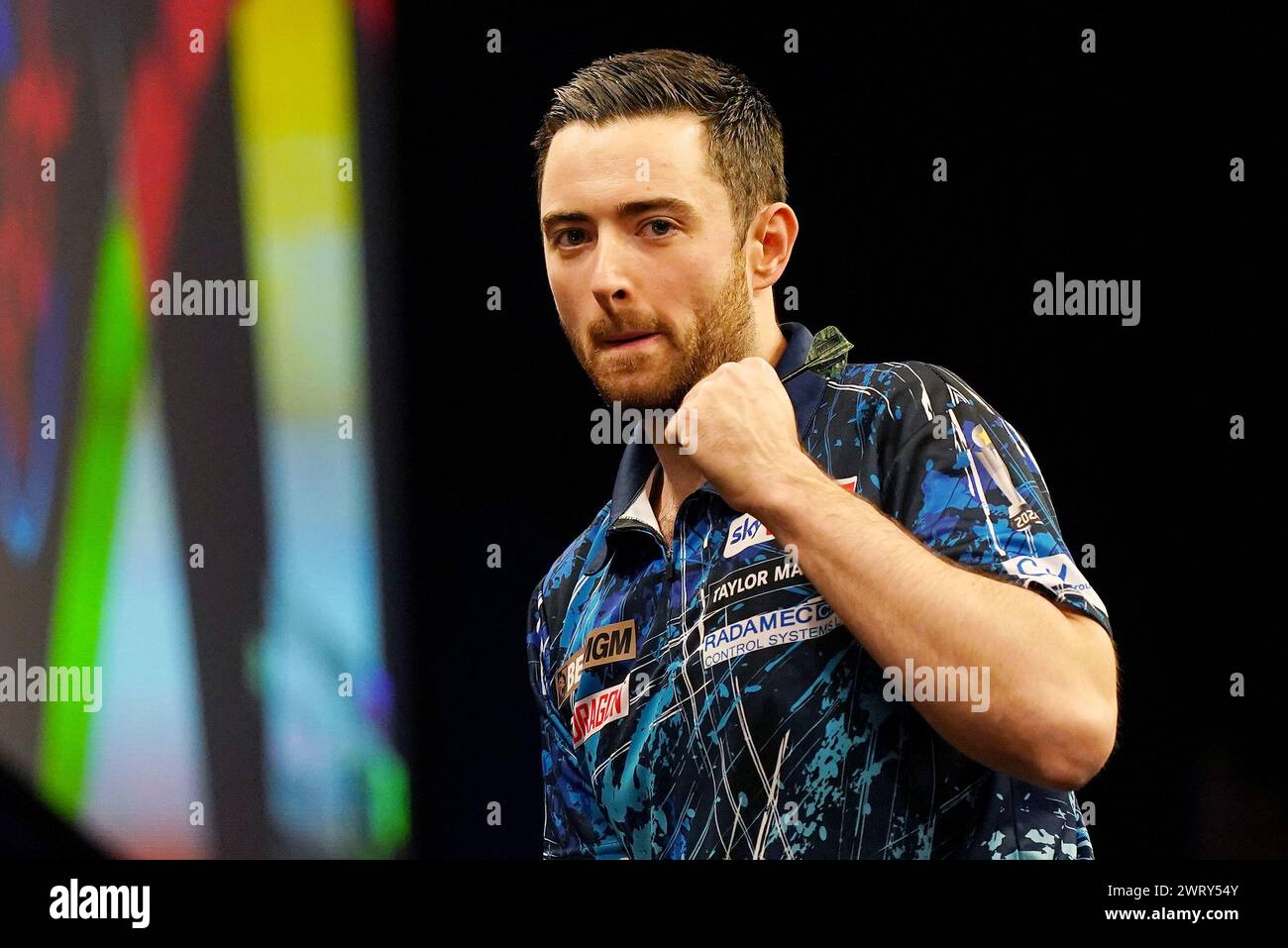 Luke Humphries celebrates victory over Nathan Aspinall (not pictured ...