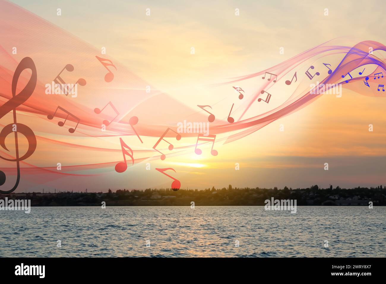 View of beautiful sky with flying music notes near river at sunset ...