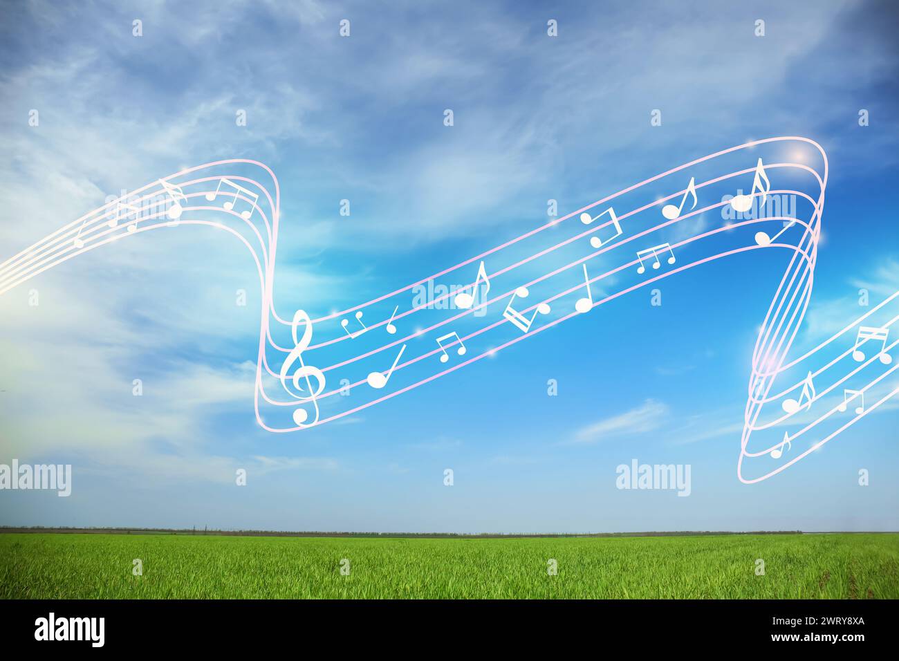 View of beautiful sky with clouds and flying music notes in countryside ...