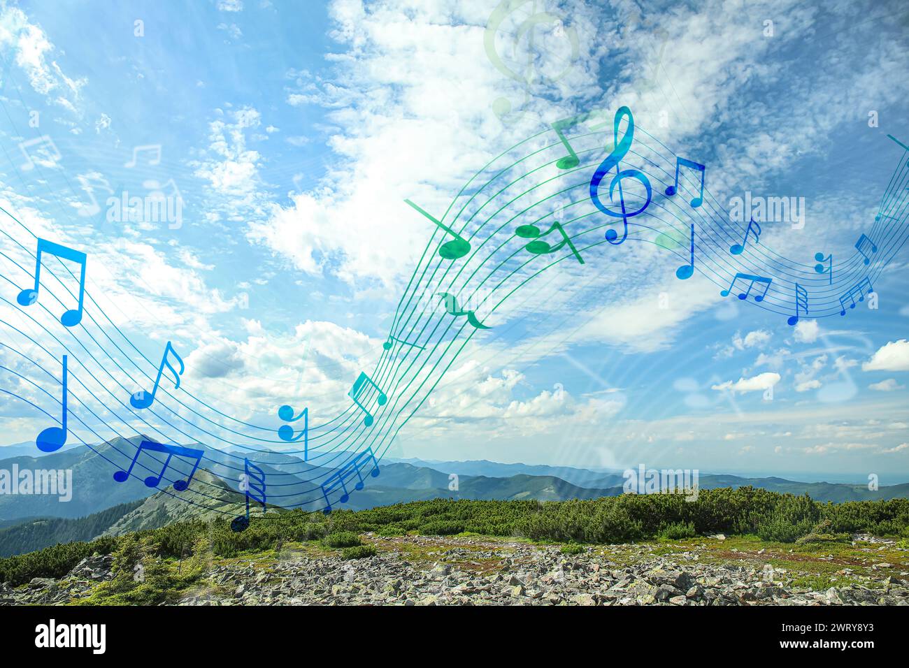 View of beautiful sky with clouds and flying music notes in mountains ...