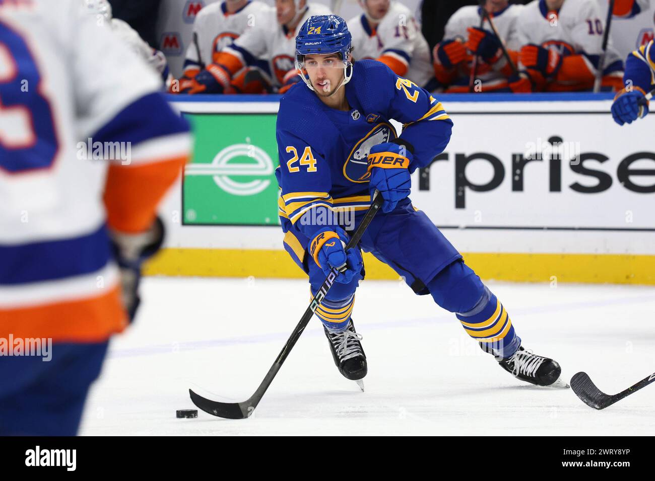 Buffalo Sabres center Dylan Cozens (24) carries the puck into the zone ...