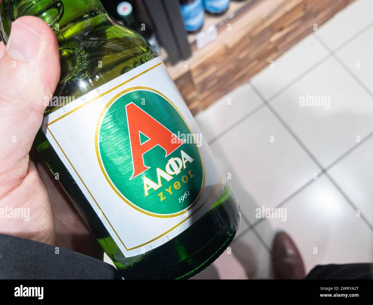 Picture of a bottle of Alfa with their logo in a supermarket of ...