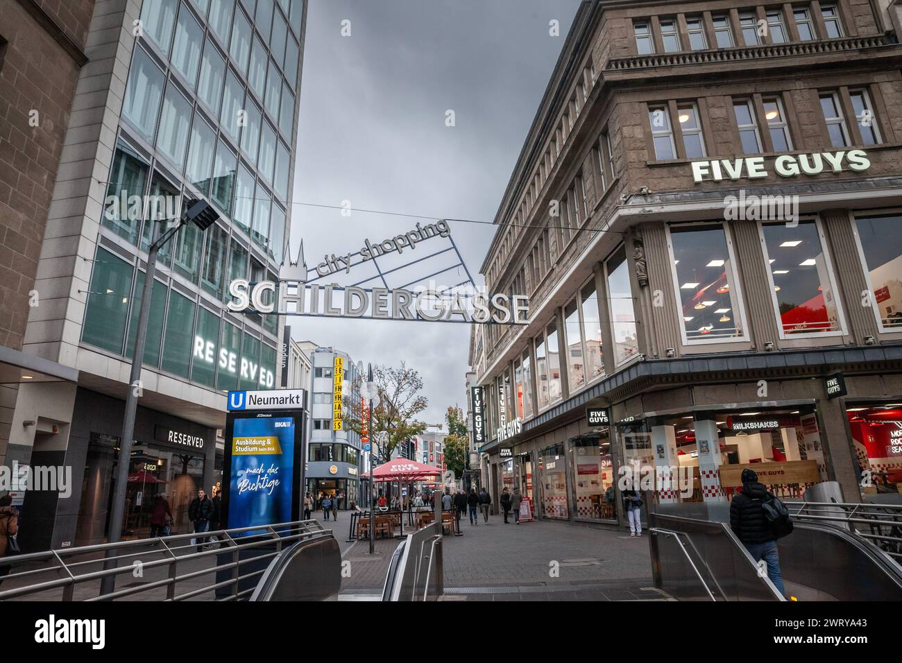 People walking in the schildergasse street of Cologne, Germany. The ...