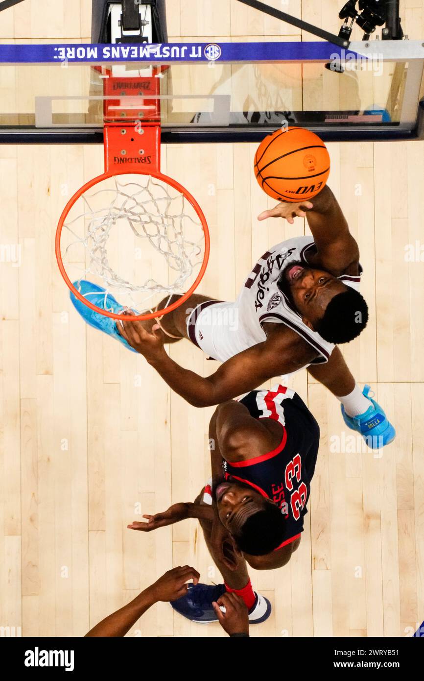Texas A&M forward Wildens Leveque (10) scores as Mississippi forward ...