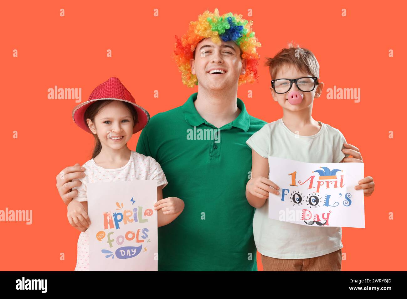 Father and his little children with funny disguises and April Fool's ...