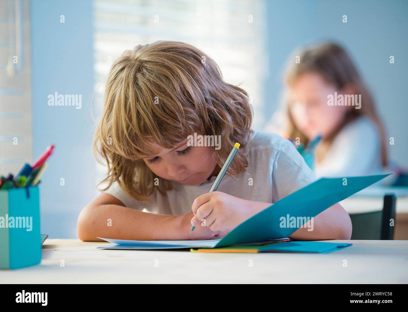 Kids in classroom at school. Education and learning. Elementary school ...
