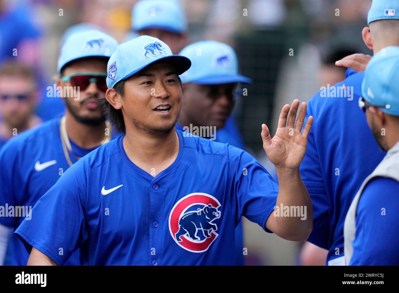 Chicago Cubs starting pitcher Shota Imanaga, of Japan, smiles as he ...