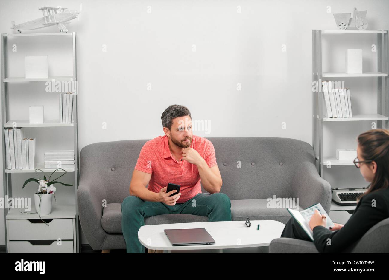 Psychologist helping young man to solve men problems. Psychological ...