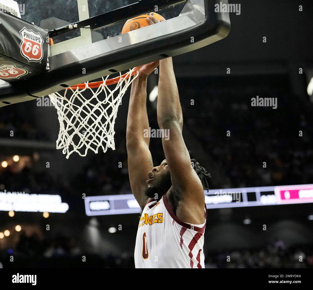 MAR 14 2024: Iowa State Cyclones forward Tre King (0) slam dunks ...