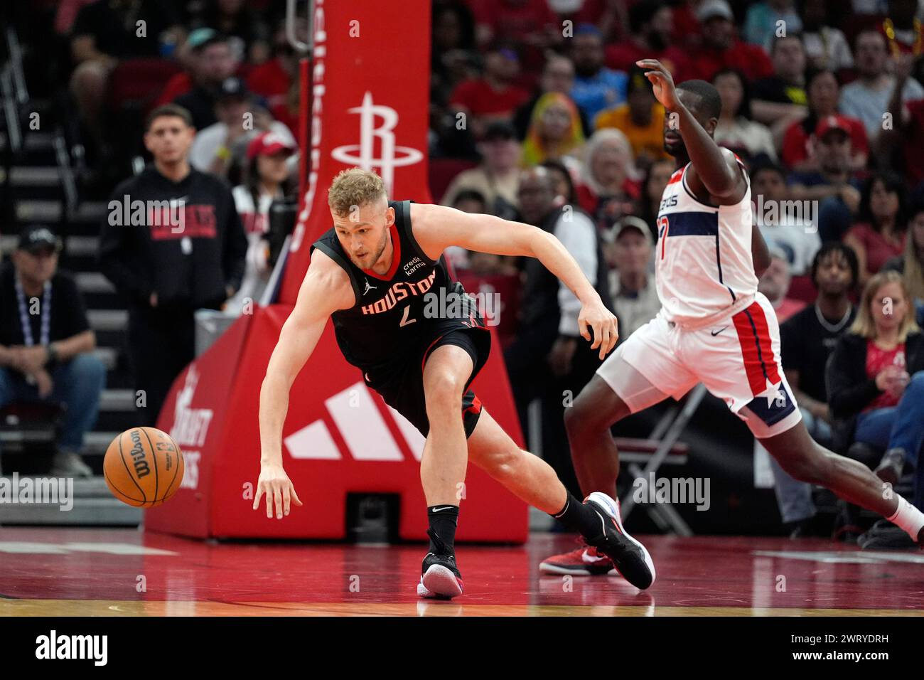 Houston Rockets' Jock Landale (2) loses teh bsll as Washington Wizards ...