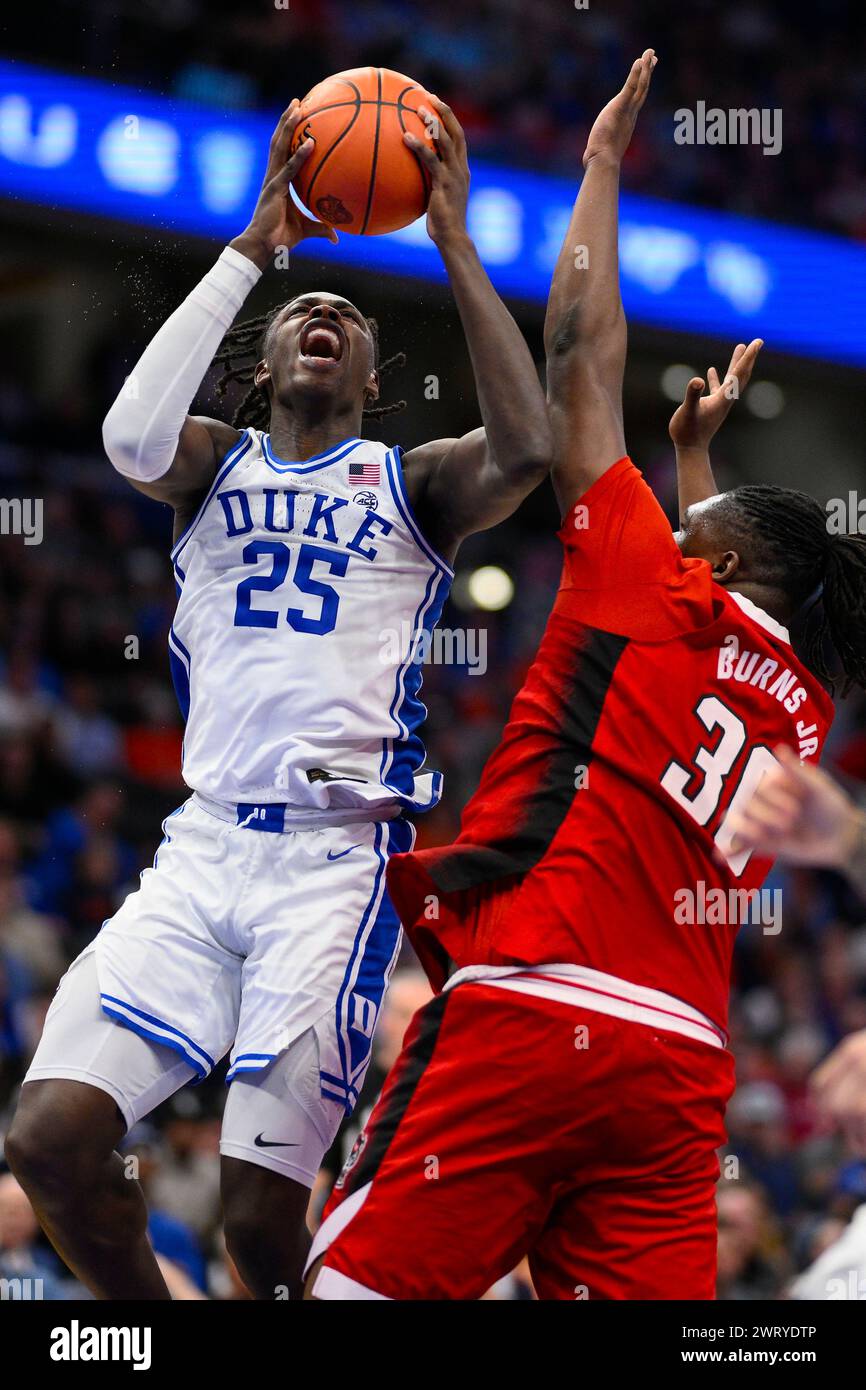 Duke forward Mark Mitchell (25) collides with North Carolina State ...