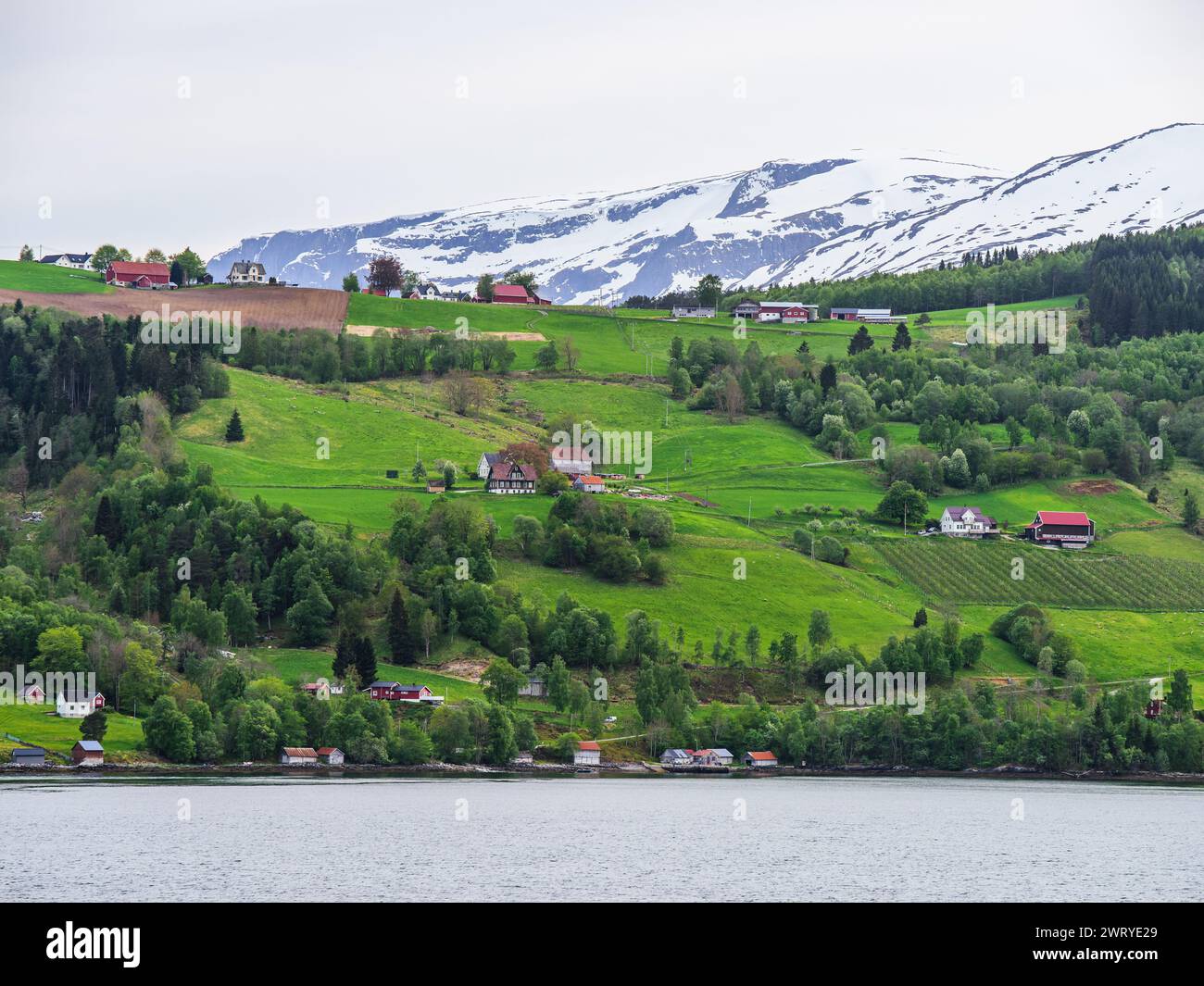 Mountains and Fiord over Norwegian Village, Olden, Innvikfjorden ...
