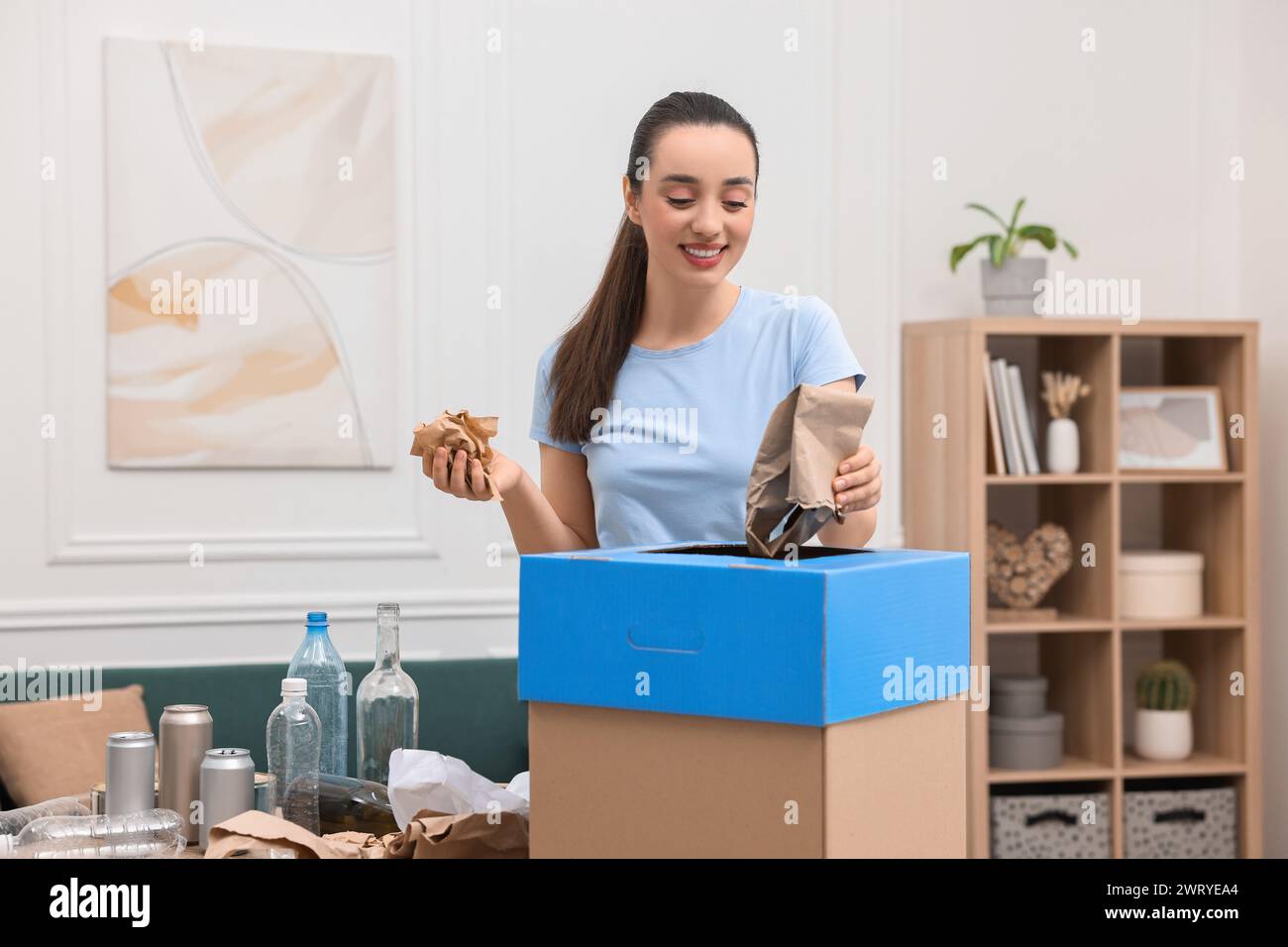 Woman throwing crumpled paper hi-res stock photography and images - Alamy