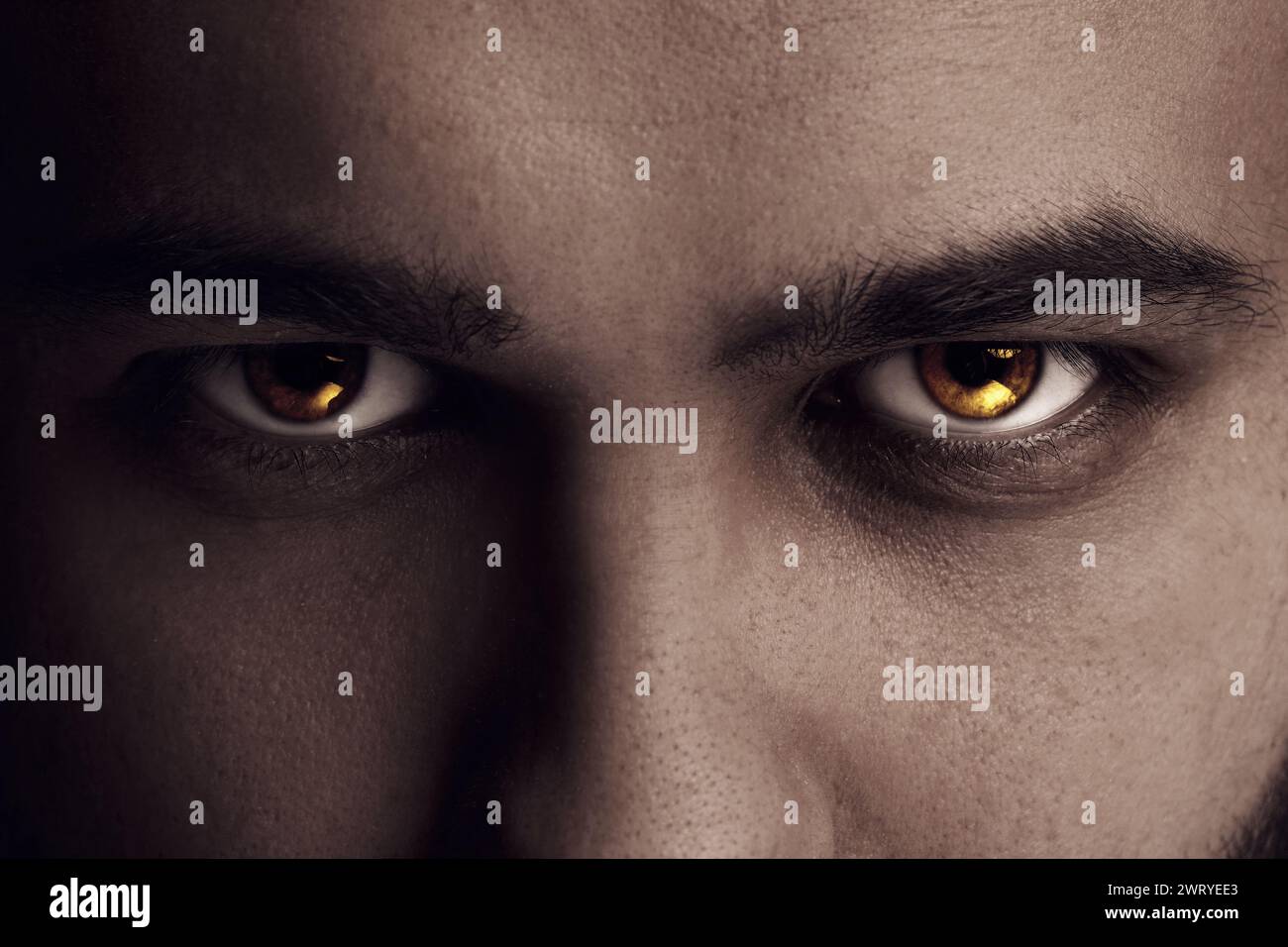 Evil eye, captivating gaze. Man with rare eye color, closeup Stock ...