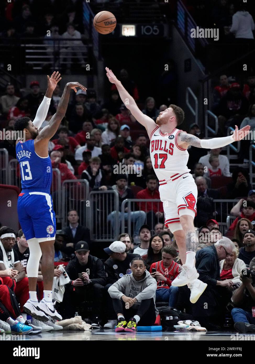 Los Angeles Clippers forward Paul George, left, shoots over Chicago ...