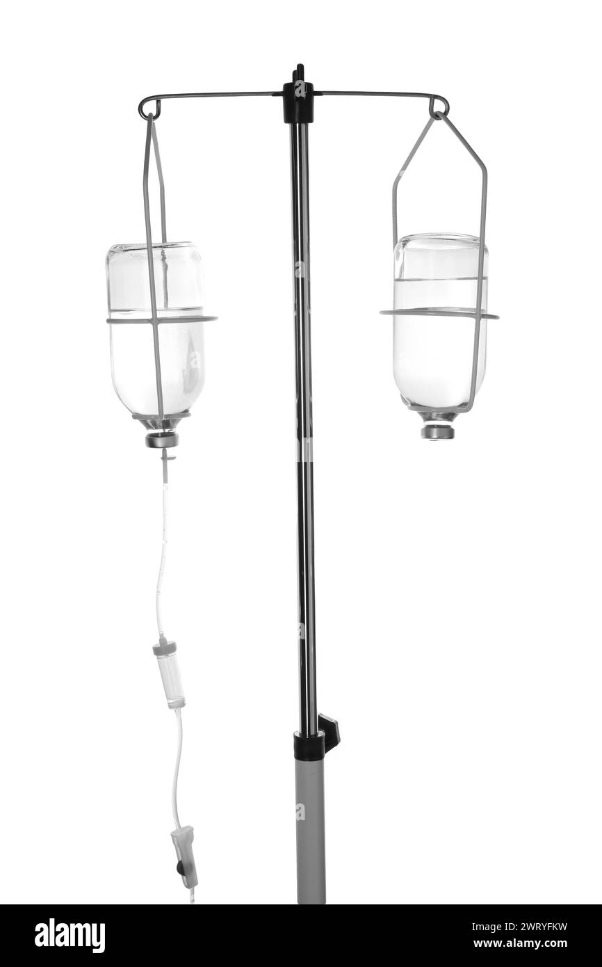 IV infusion set on pole against white background Stock Photo - Alamy