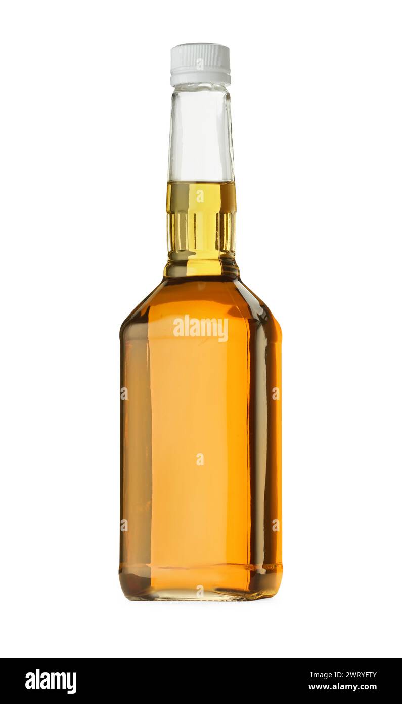 Whiskey in glass bottle isolated on white Stock Photo - Alamy