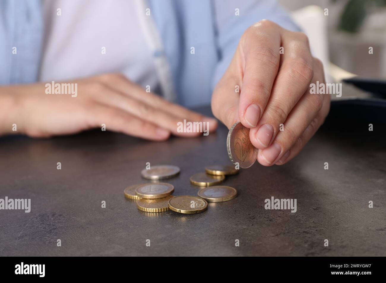 Beggar counting coins hi-res stock photography and images - Alamy