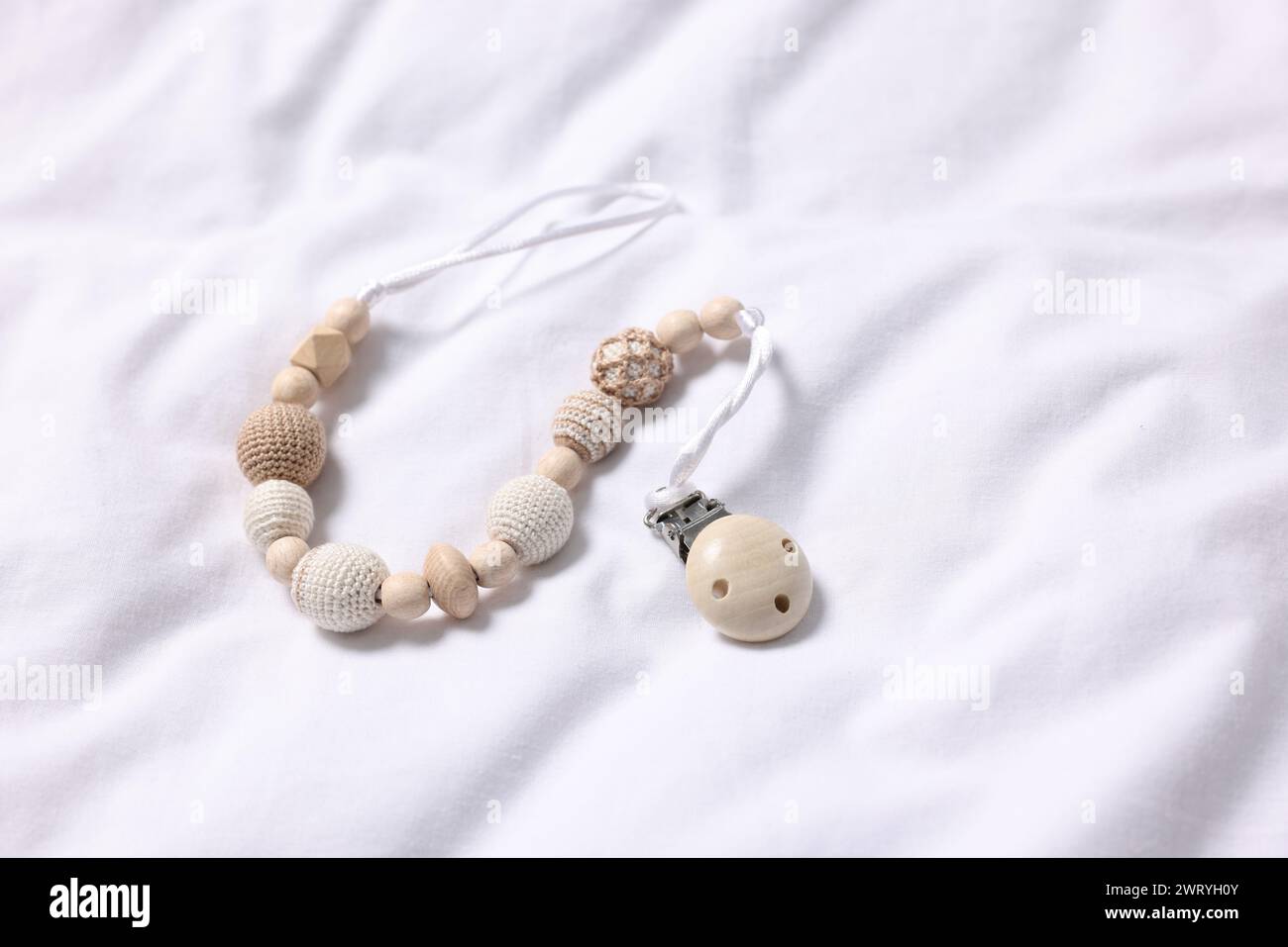 Pacifier clip hi-res stock photography and images - Alamy