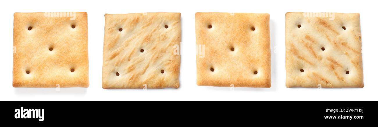 Set of delicious crackers isolated on white, top view. Banner design ...